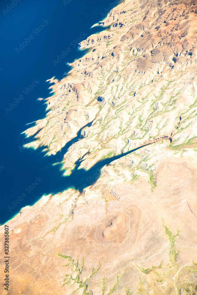 Aerial Photography of landforms over Nevada with Lake Mead in view ...