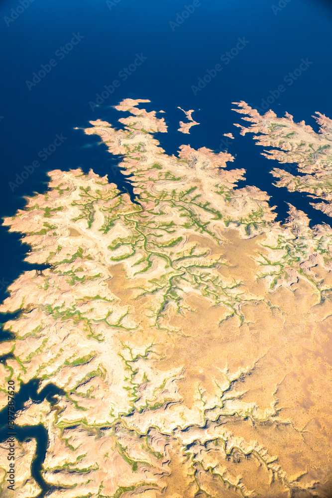Aerial Photography of landforms over Nevada with Lake Mead in view ...