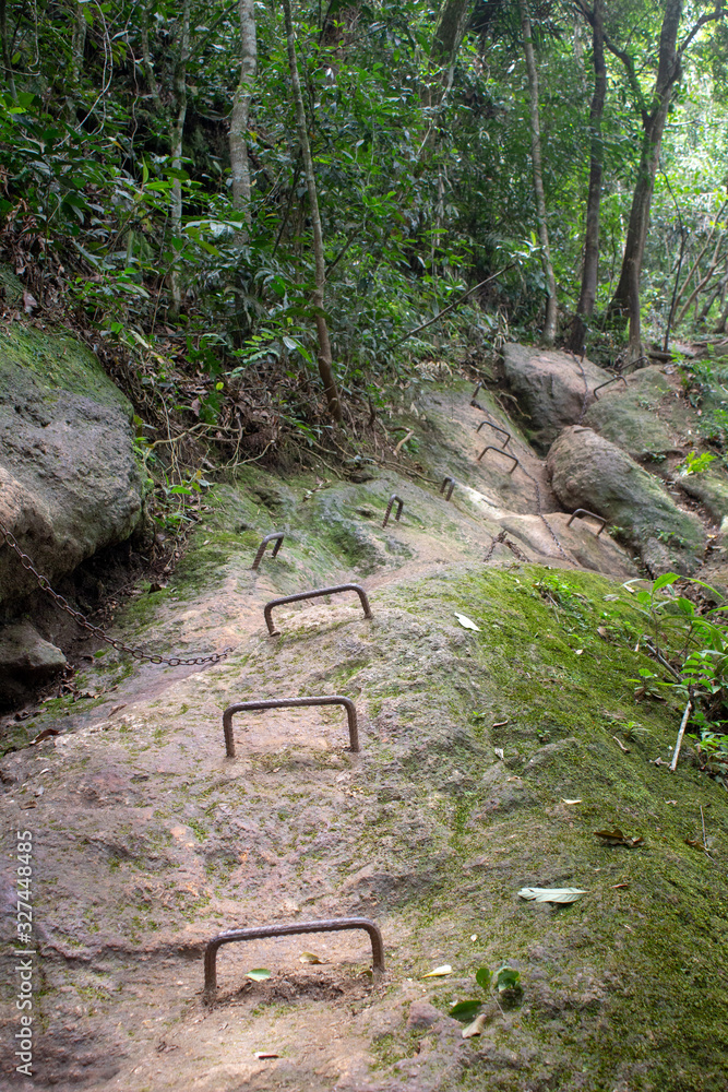 Steep part with chains and iron ladder on the rock of Parque Lage to ...
