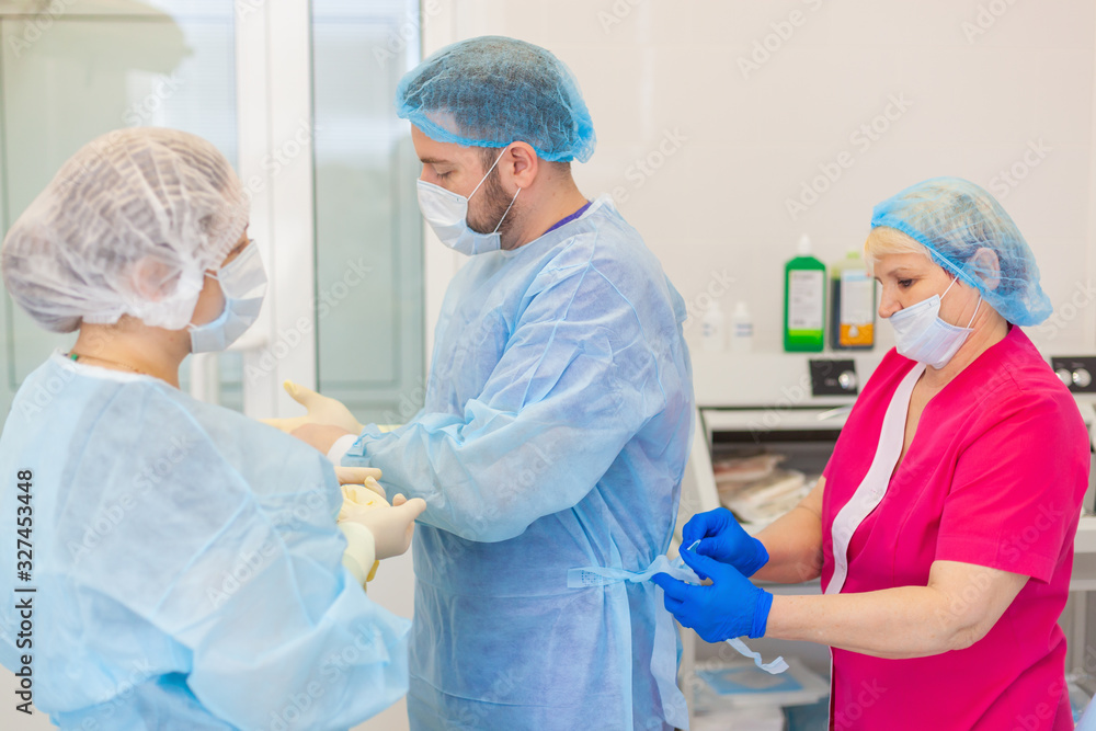 Hospital. Surgeon operates in the operating room. Profile view of a ...