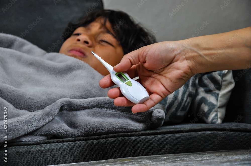 coronavirus young boy symptom blue glove thermometer dead lying mask ...