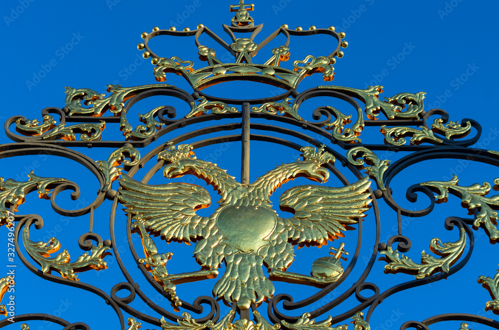 Glittering golden double-headed eagle - the coat of arms of Russian ...