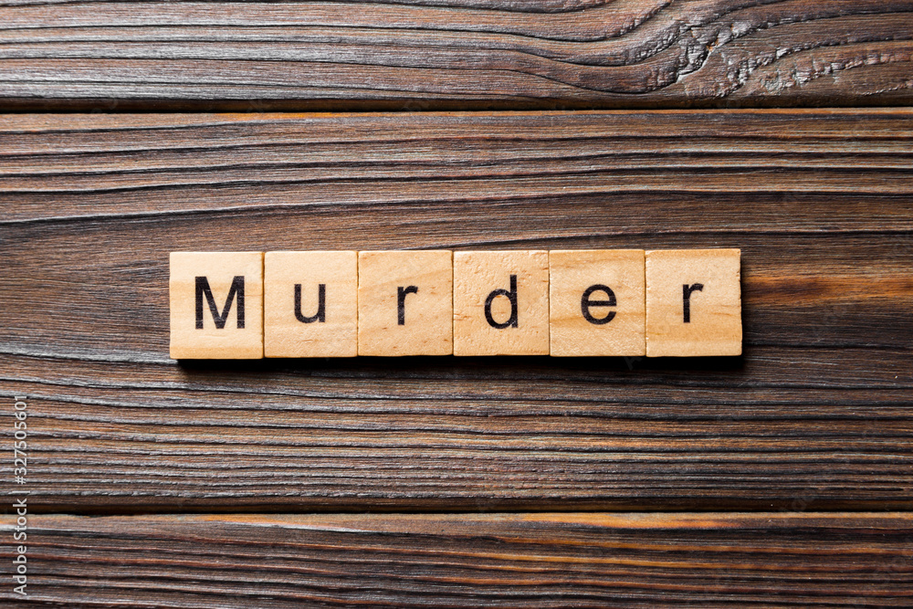 murder word written on wood block. murder text on table, concept Stock ...