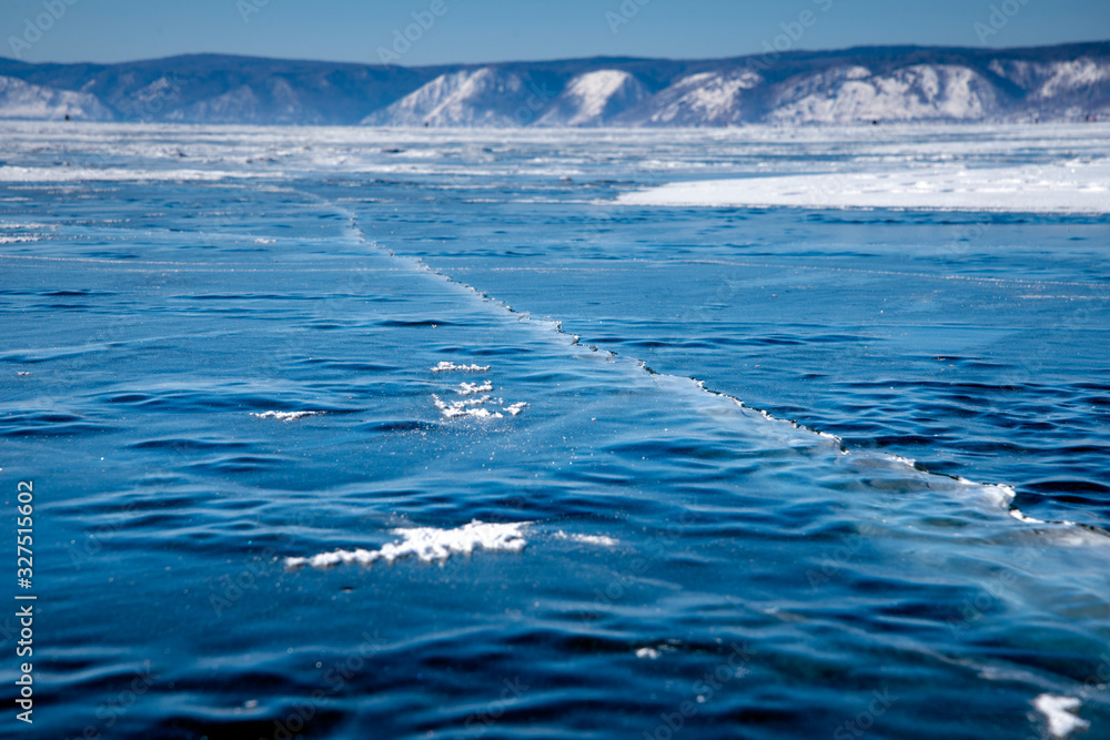 Methane Bubbles in the Baikal Ice.ice and cracks on the surface of Lake ...