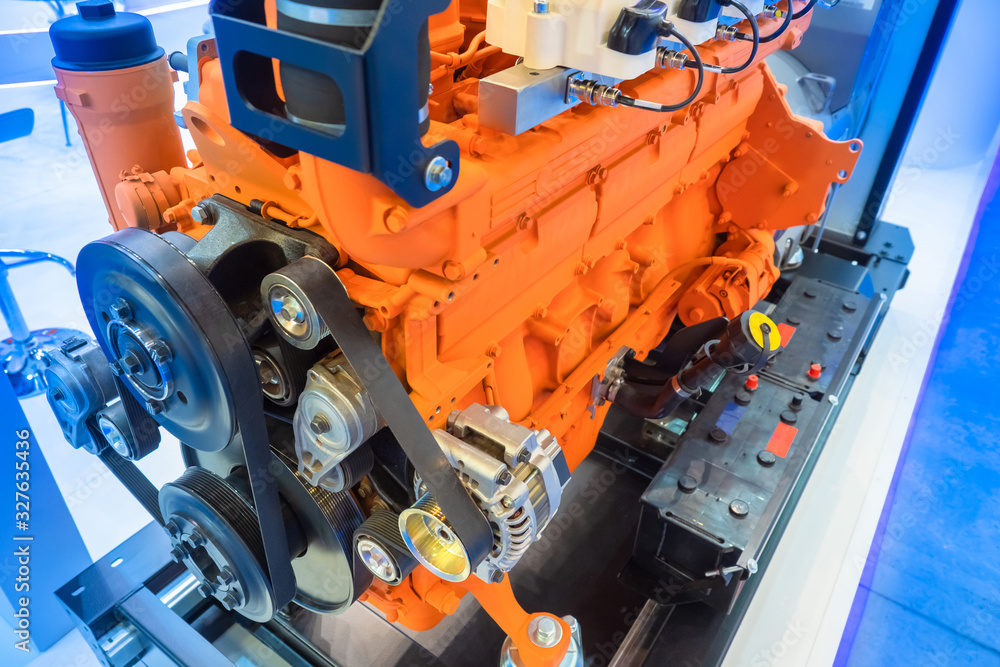 Car motor close-up. Diesel engine from the car. An orange engine pulled ...