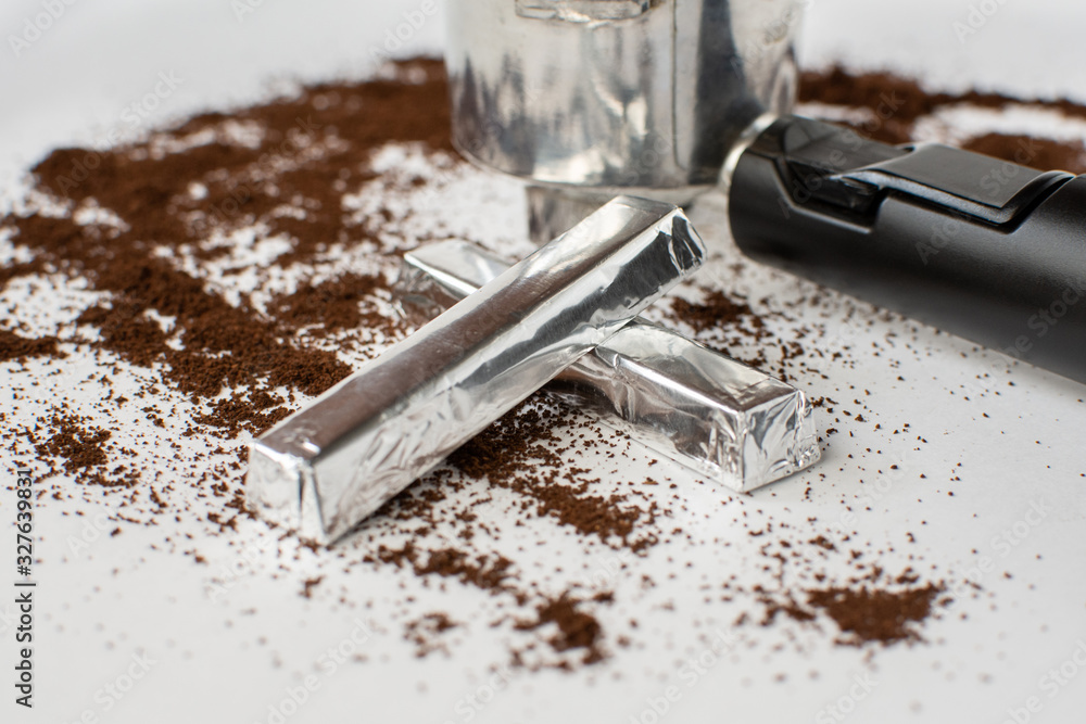 Mini chocolate bars on a white background with ground coffee. Stock ...