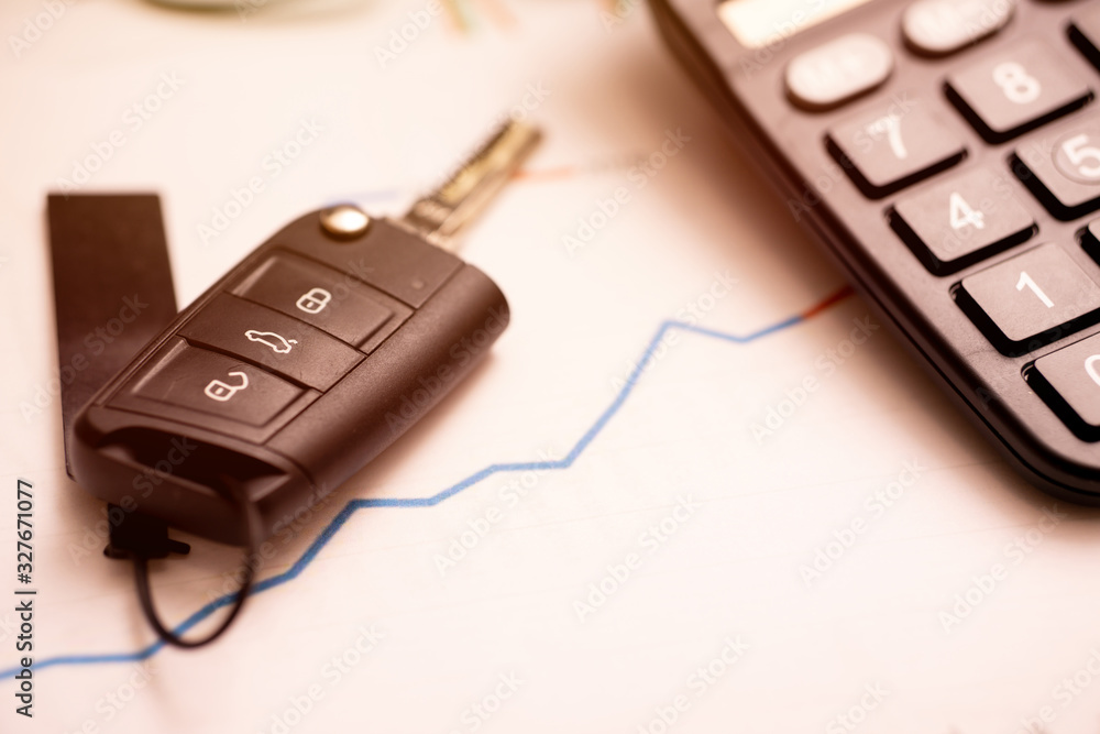 car sales chart concept visual. car keys, graphics and calculator Stock ...