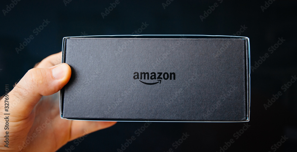 Paris, France - Jun 7, 2019: Amazon logotype on the cardboard box of ...
