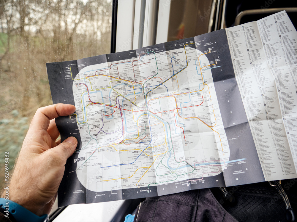 Paris, France - Jan 30, 2018: Hand holding POV map of Parisian New ...