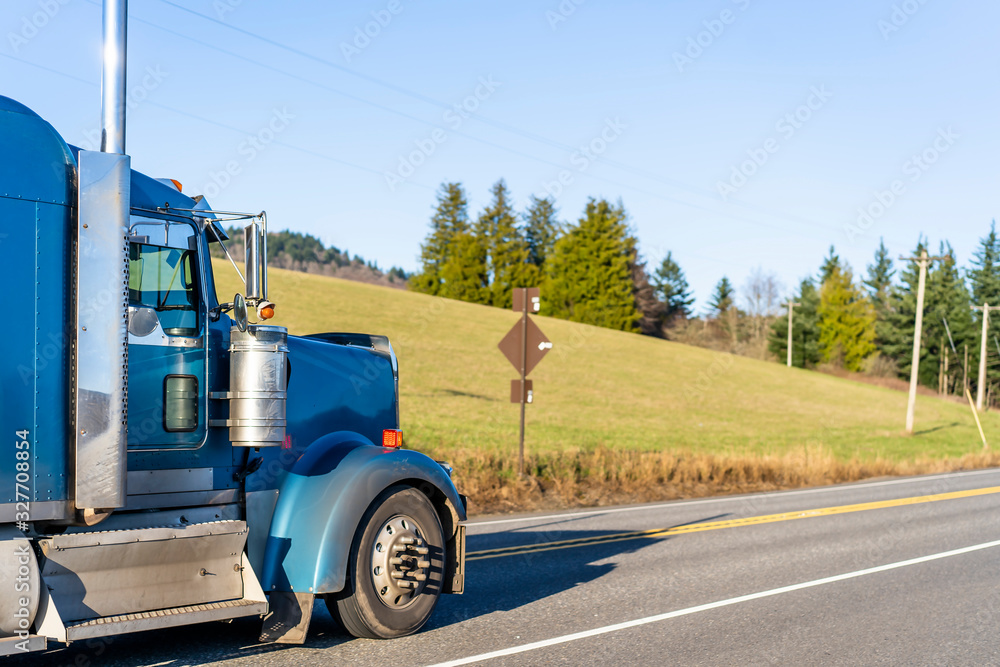 Blue big rig classic semi truck with chrome and aluminum accessories ...