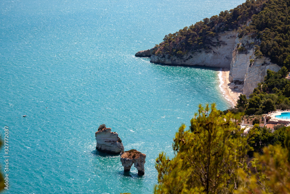 Famous sea stacks of Baia delle Zagare in Gargano National park ...
