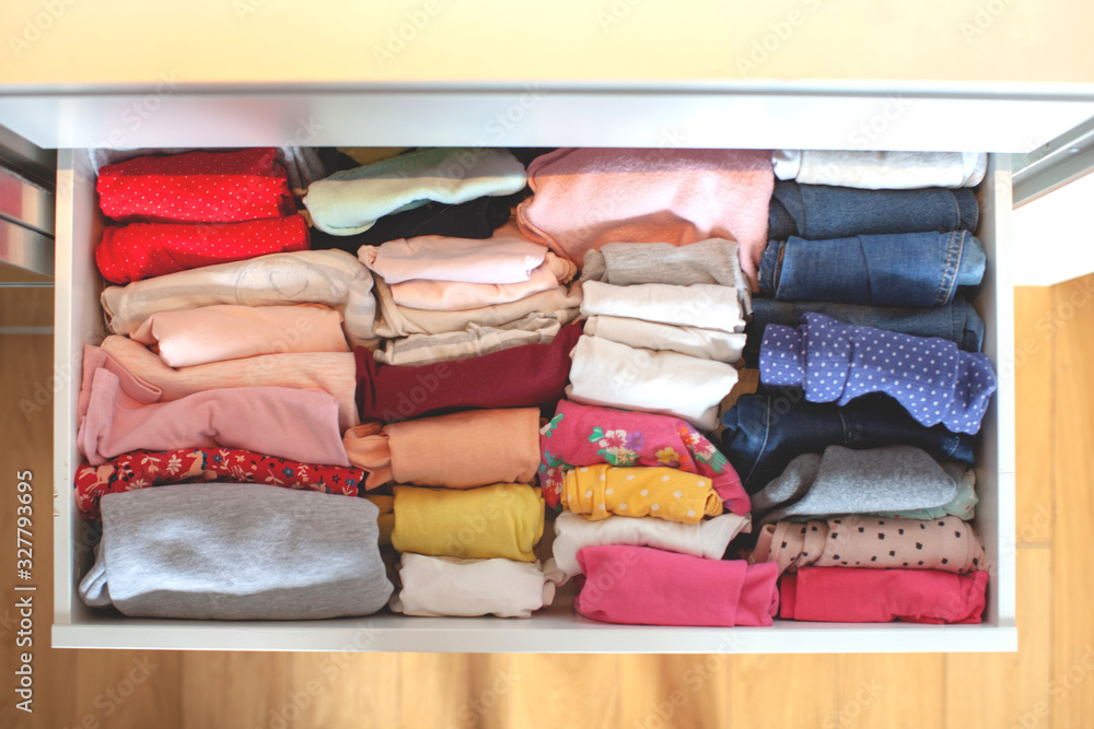 Vertical storage of clothing. Clothing folded for vertical storage in ...