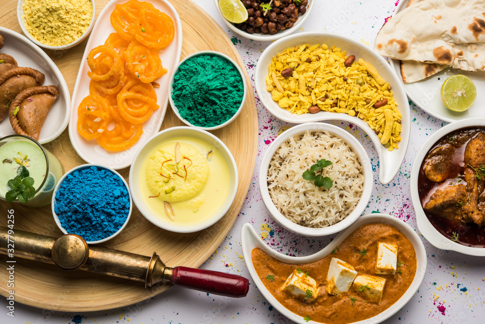 Happy Holy concept showing Indian assorted lunch food like chicken ...