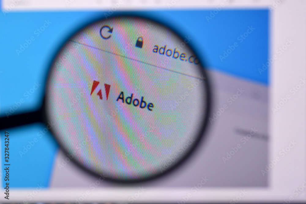 Homepage of adobe website on the display of PC, url - adobe.com. Stock ...