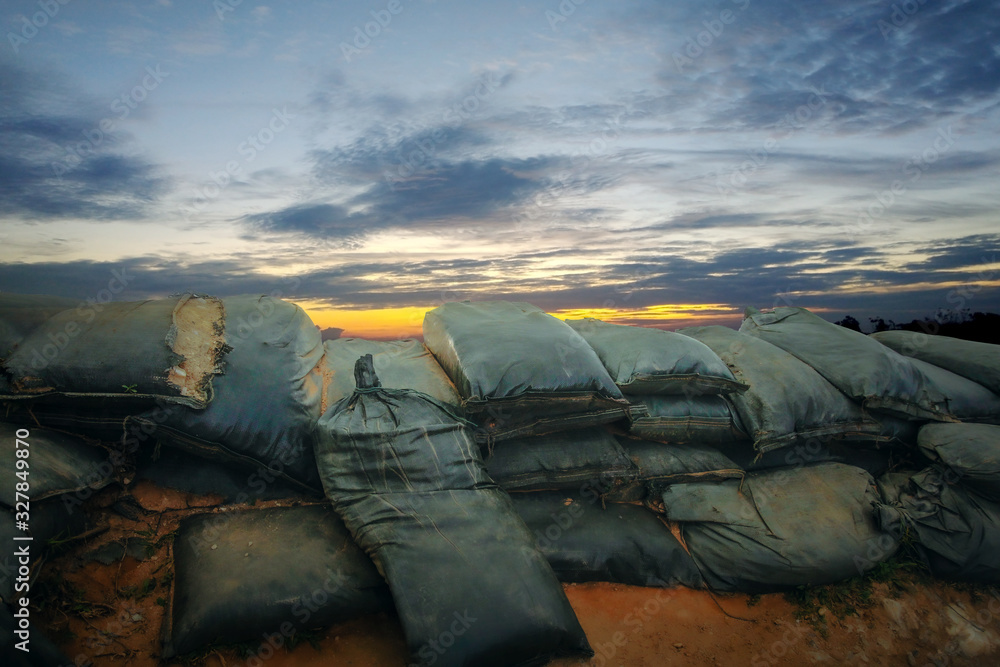 Sandbag in front line. Military bunker base in war zone. Military ...