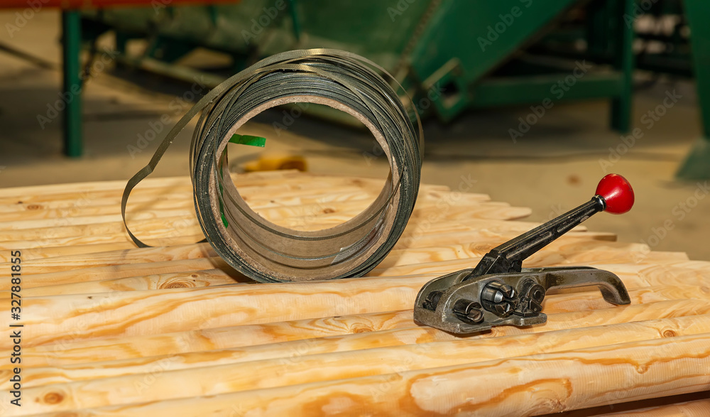 Manual tensioner for tying lumber. Stock Photo | Adobe Stock