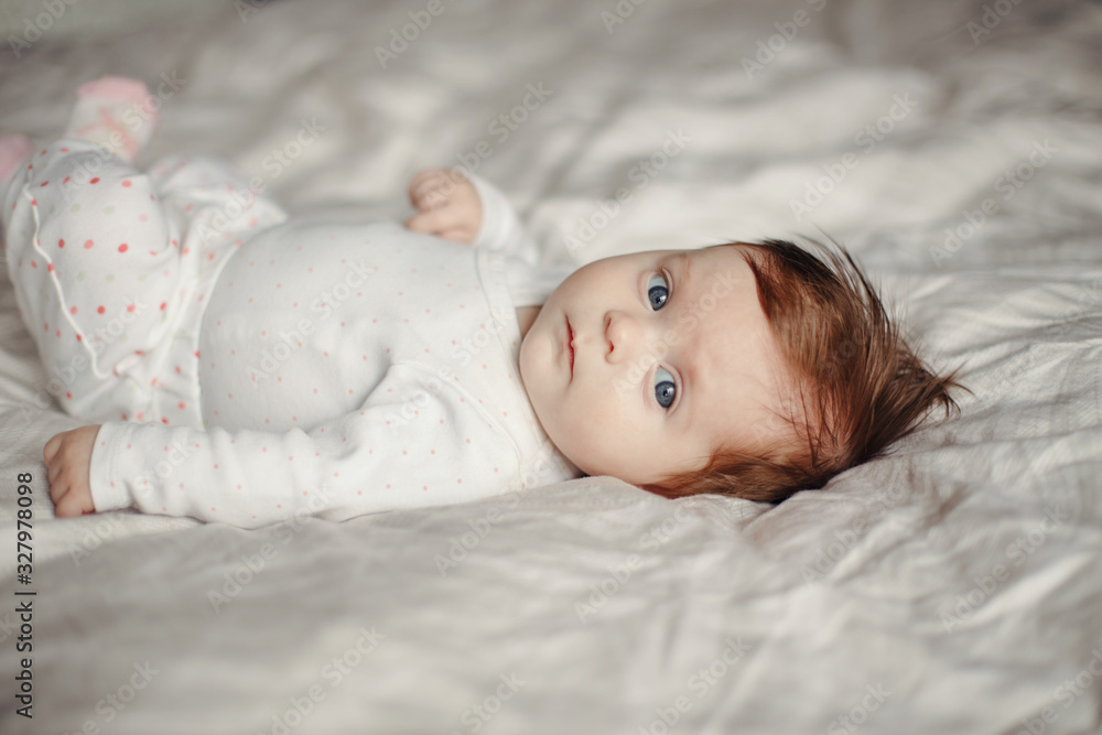 Closeup portrait of cute Caucasian newborn baby. Adorable funny child ...