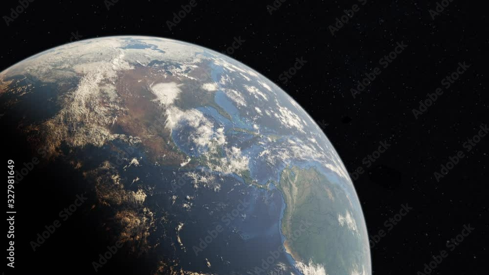 Slow zoom in on and rotation of the earth with stars in the background ...