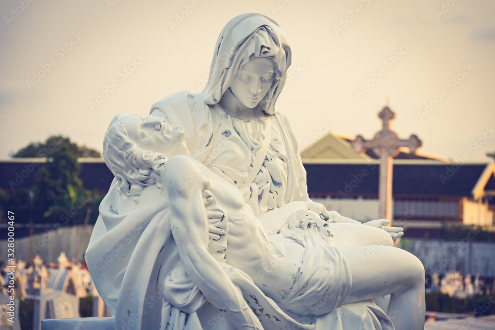 La Pieta statue - The blessed Virgin Mary holding dead Jesus Christ body Stock Photo | Adobe Stock
