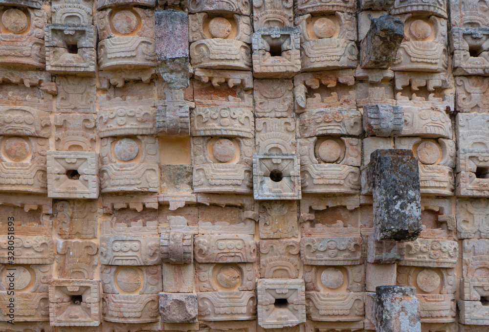Traditional Mayan symbols. Fragment of palace of the Masks (Codz Poop ...