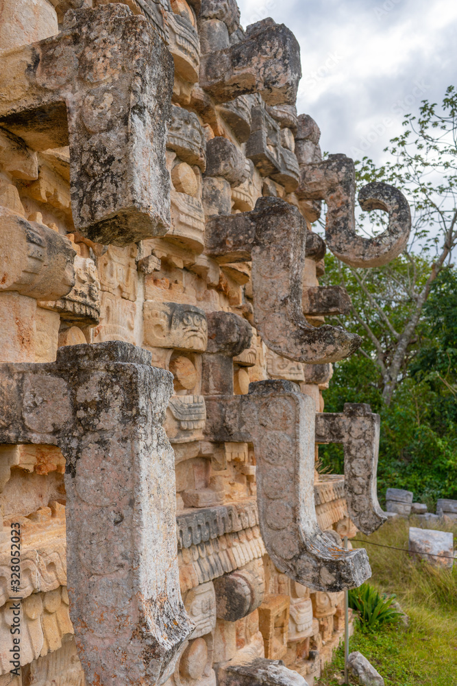 Traditional Mayan symbols. Fragment of palace of the Masks (Codz Poop ...