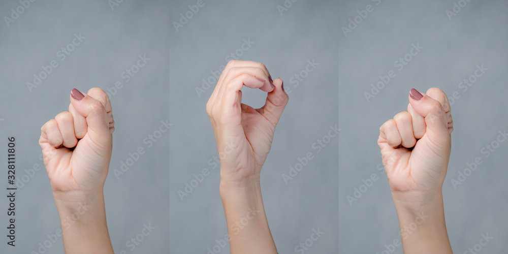 Crop shot of beautiful woman's hand doing sign languages of the word ...