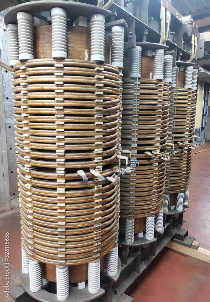 internal parts (core and coils) of three phase distribution transformer ...
