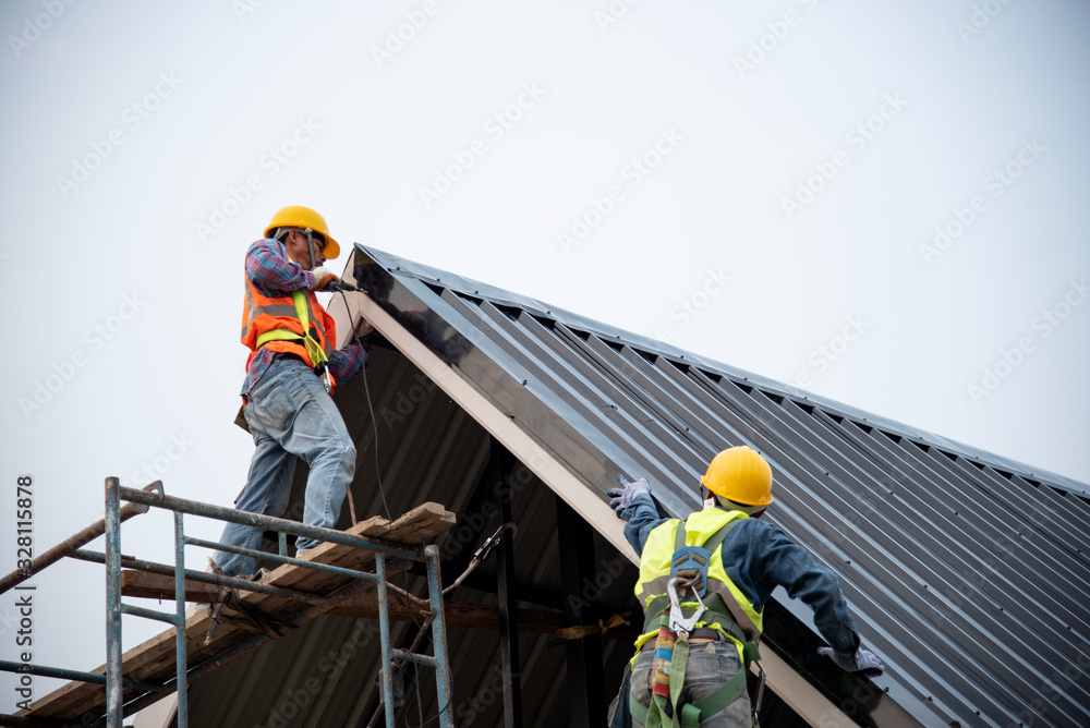Technician is Work Roof Repair Construction engineer wear safety ...