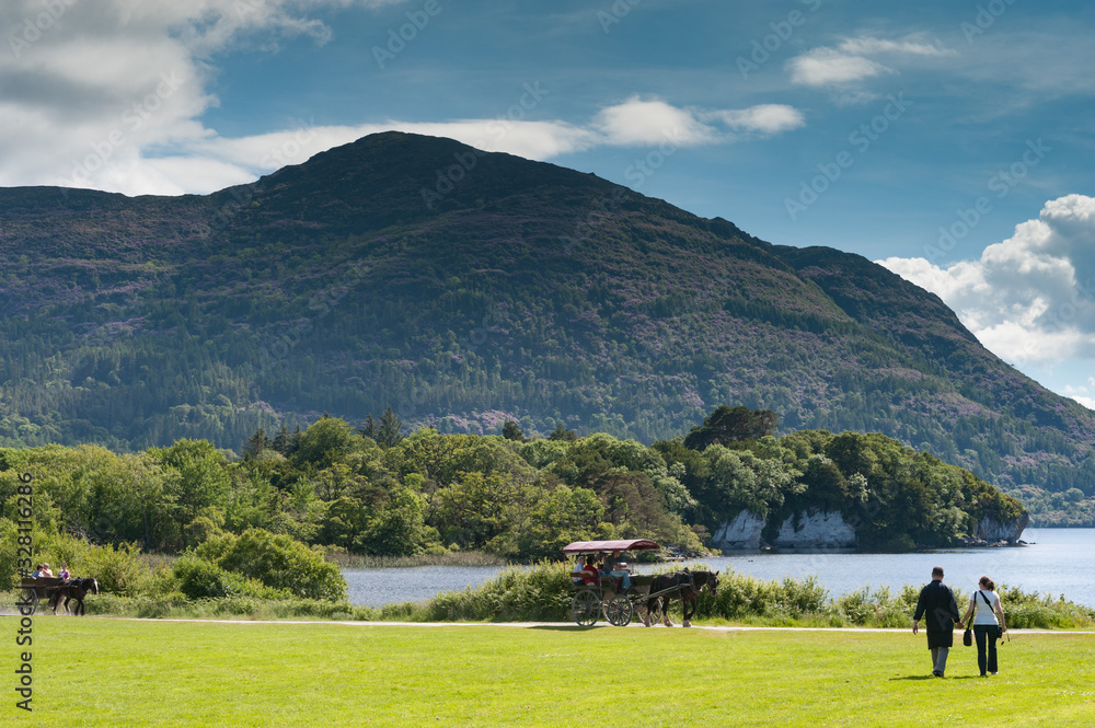 Tourists walking the grounds of Muckross house in Killarney national ...