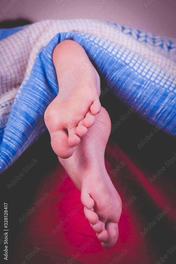 Sleep, rest and relax concept. Little child girl sleeping in bed at ...