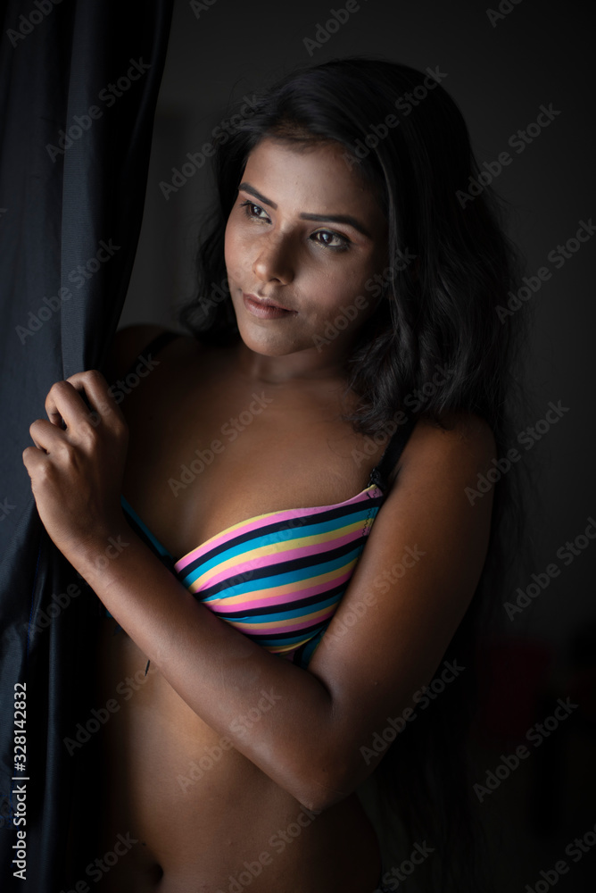 Portrait Of Young And Beautiful Dark Skinned Indian Bengali Woman In