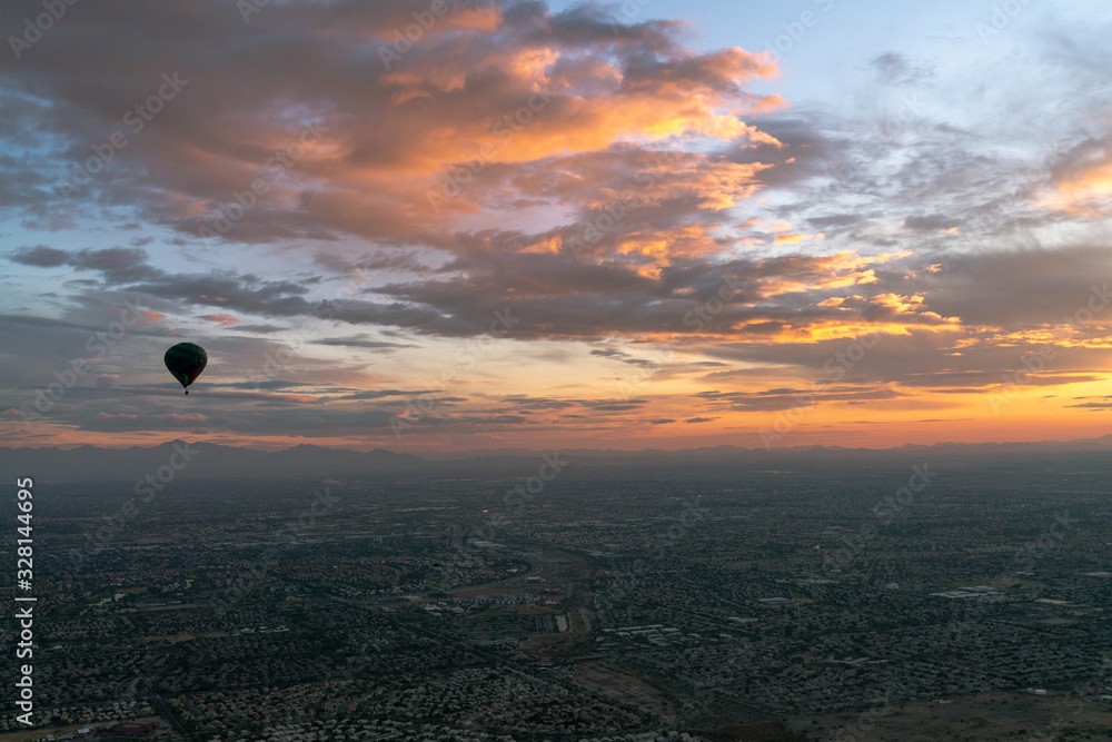 The aerial view of a hot air balloon at sunset Stock Photo | Adobe Stock