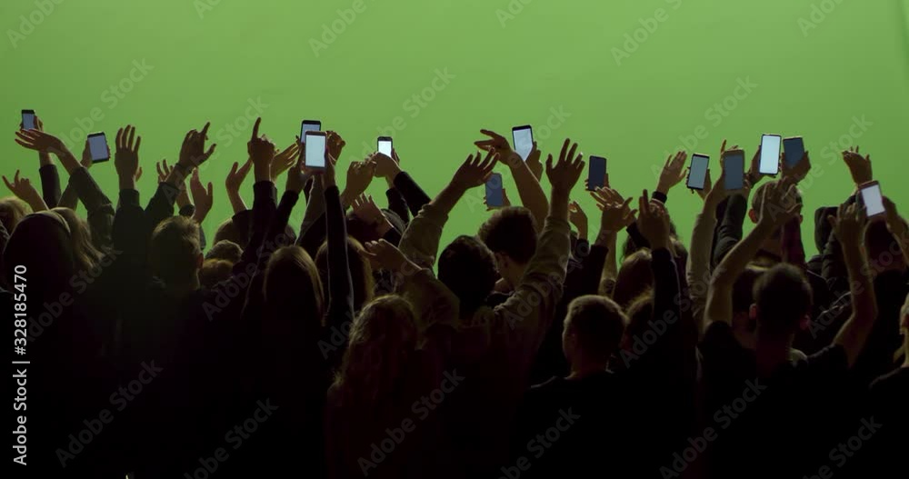 GREEN SCREEN Back view huge crowd of people with phones in hands at ...
