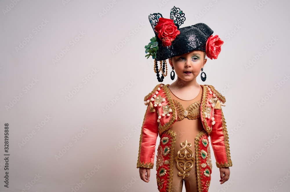 Young little caucasian kid girl wearing bullfighter traditional folkore ...