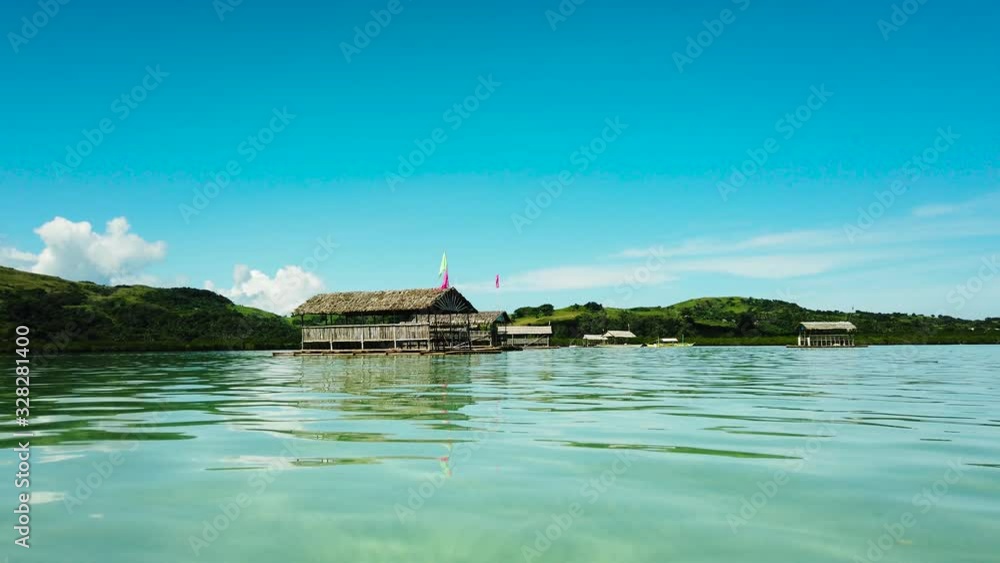 Manlawi Sandbar with floating cottages in Caramoan Islands. A floating ...