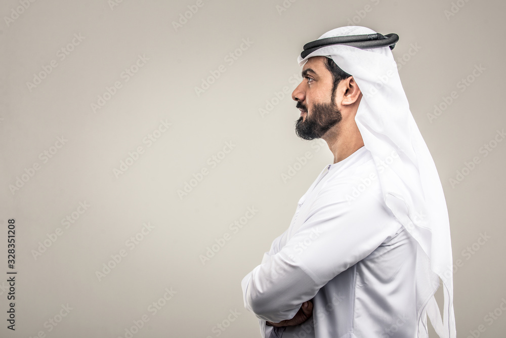 Arabian man with traditional dress Stock Photo | Adobe Stock
