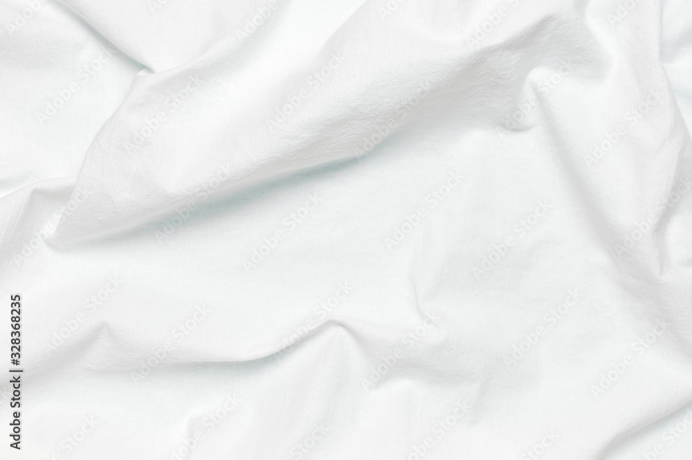 White crumpled natural cotton fabric top view. Natural linen background ...