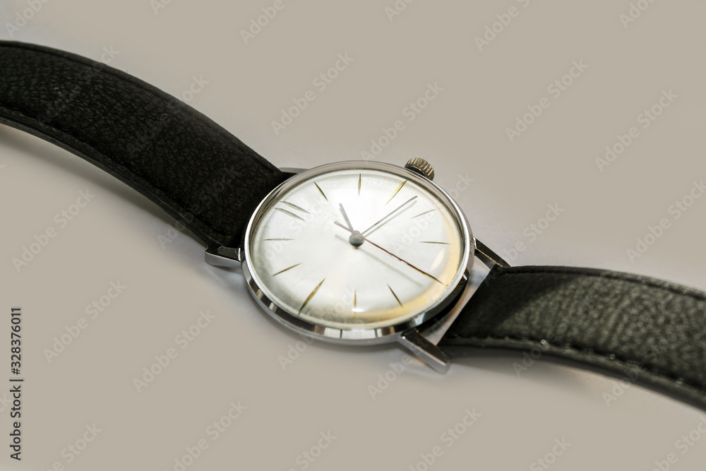 Vintage/new watch with white background and red clock hands showing the ...