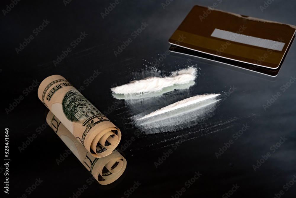 Cocaine, money and credit card on black reflective surface. Health ...