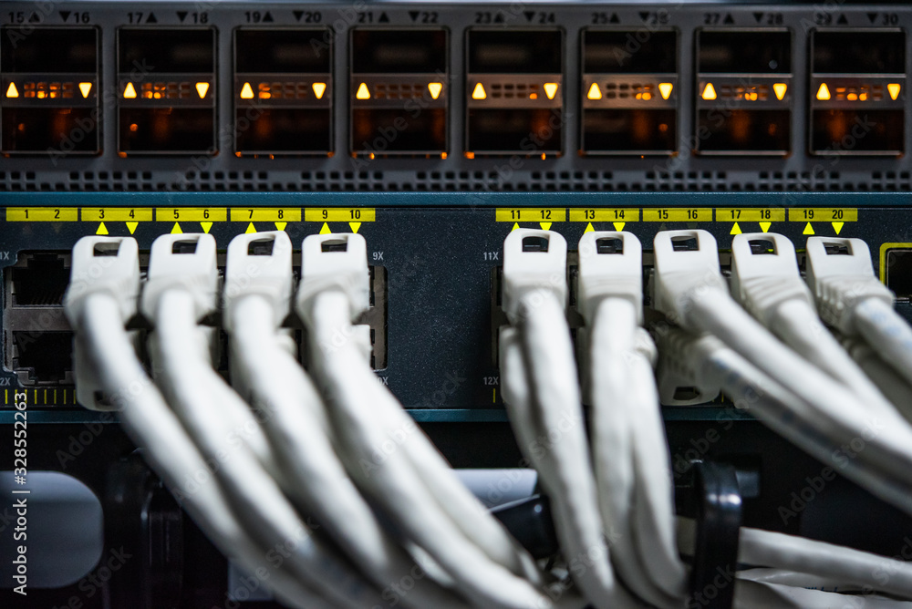 lan cables pluged in patch switch Stock Photo | Adobe Stock