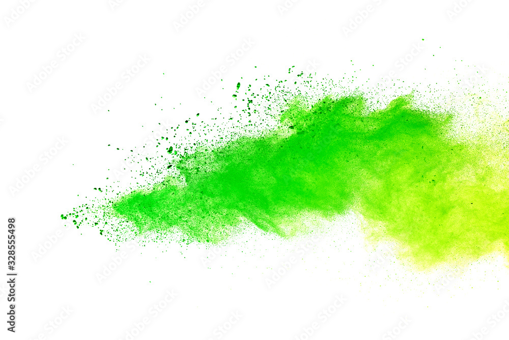 Green and yellow powder explosion on white background. Stock Photo ...