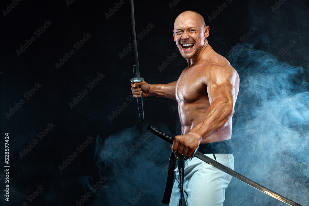 Karate fighter on black background with smoke. Shirtless man samurai ...