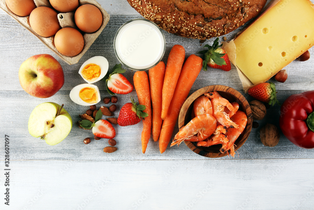 Allergy food concept. Allergy food as almonds, milk, cheese, strawberry ...