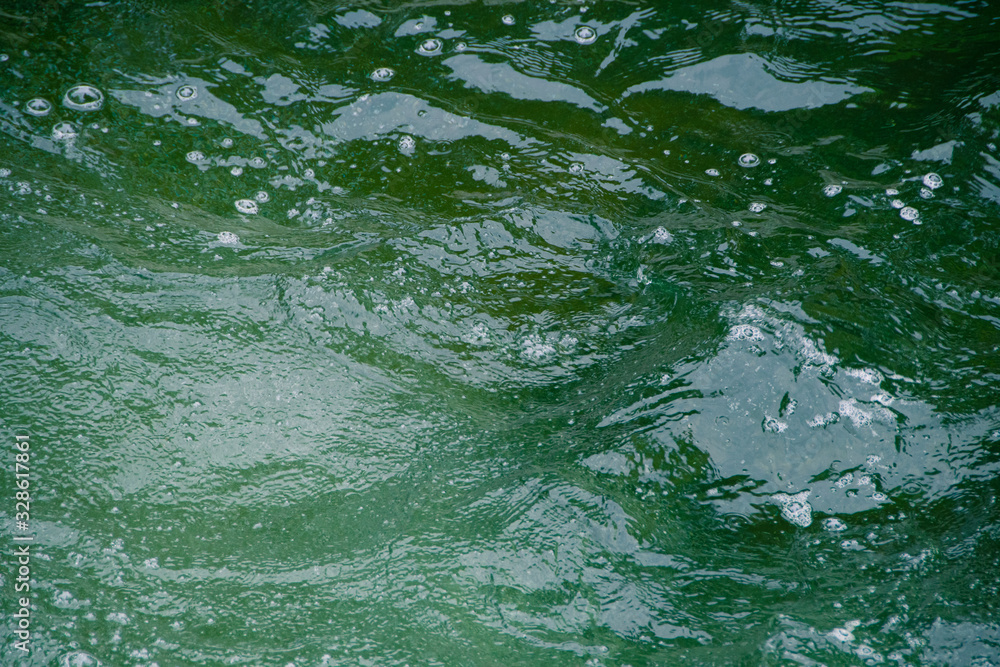 water surface of ocean, sea tide. Rapid flow of river Stock Photo ...