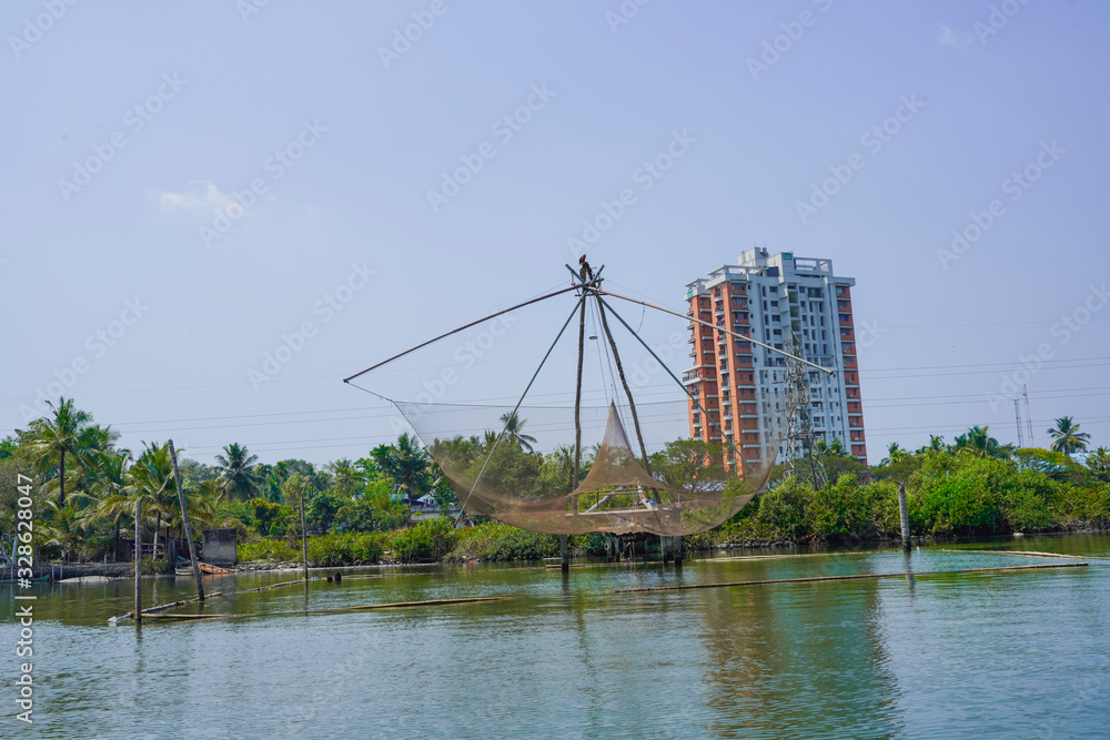 Chinese fishing nets or cheena vala are a type of stationary lift net ...