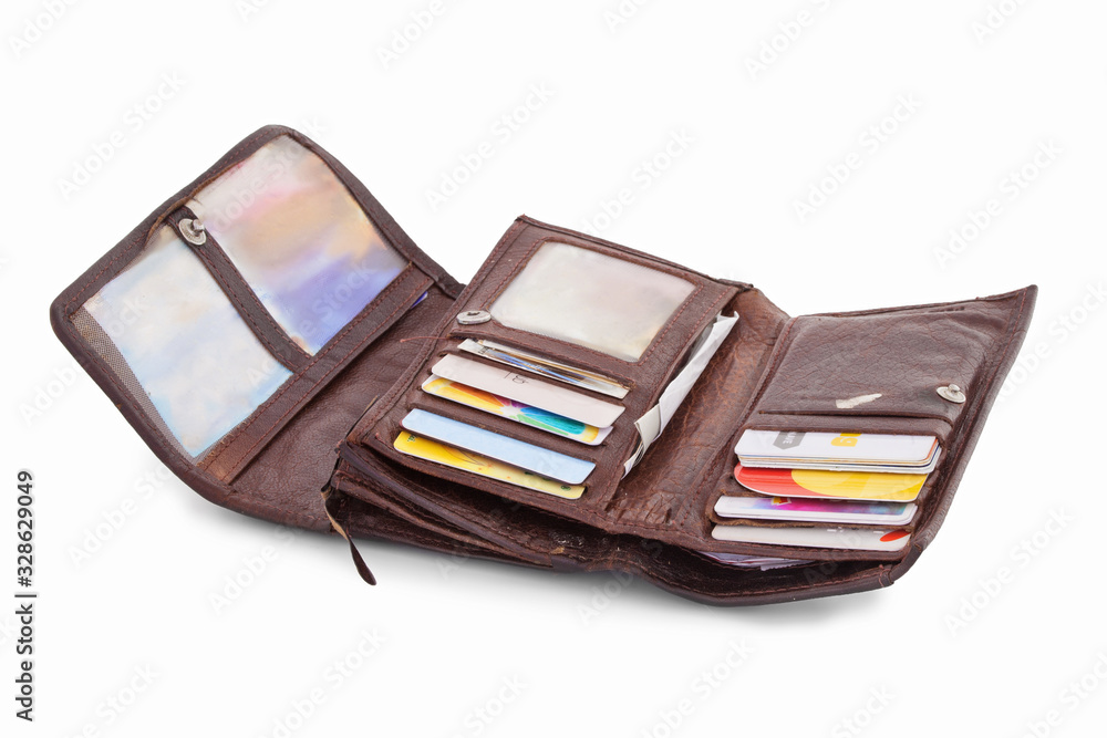 Typical open ladies wallet full of cards, pictures, books of receipts ...
