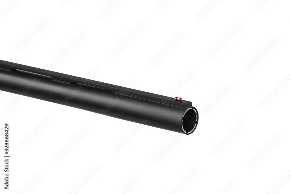 Closeup of shotgun barrel on light back. Semi-automatic shotgun with a ...