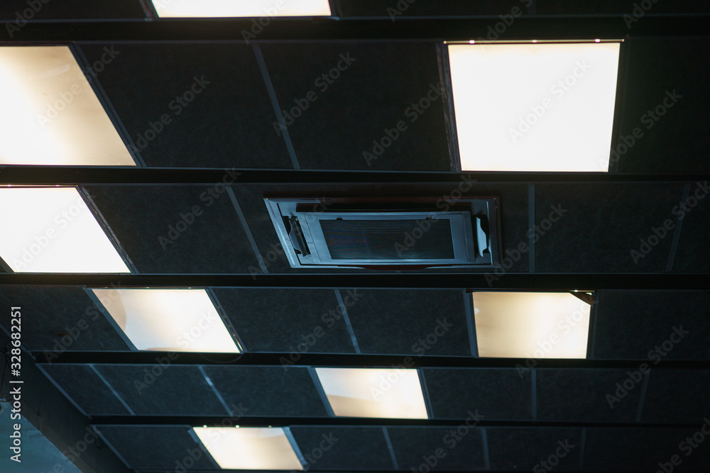 Design and details of the modern device ceilings in the room. Stock ...