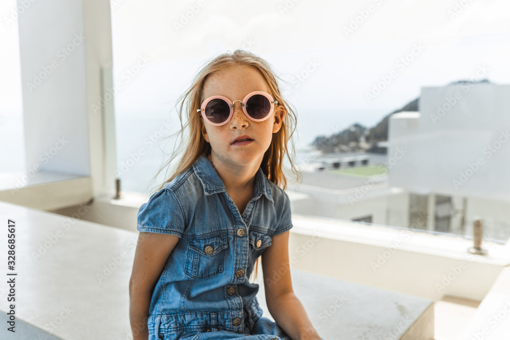Little girl with red hair shows different emotions. Sadness, joy and ...