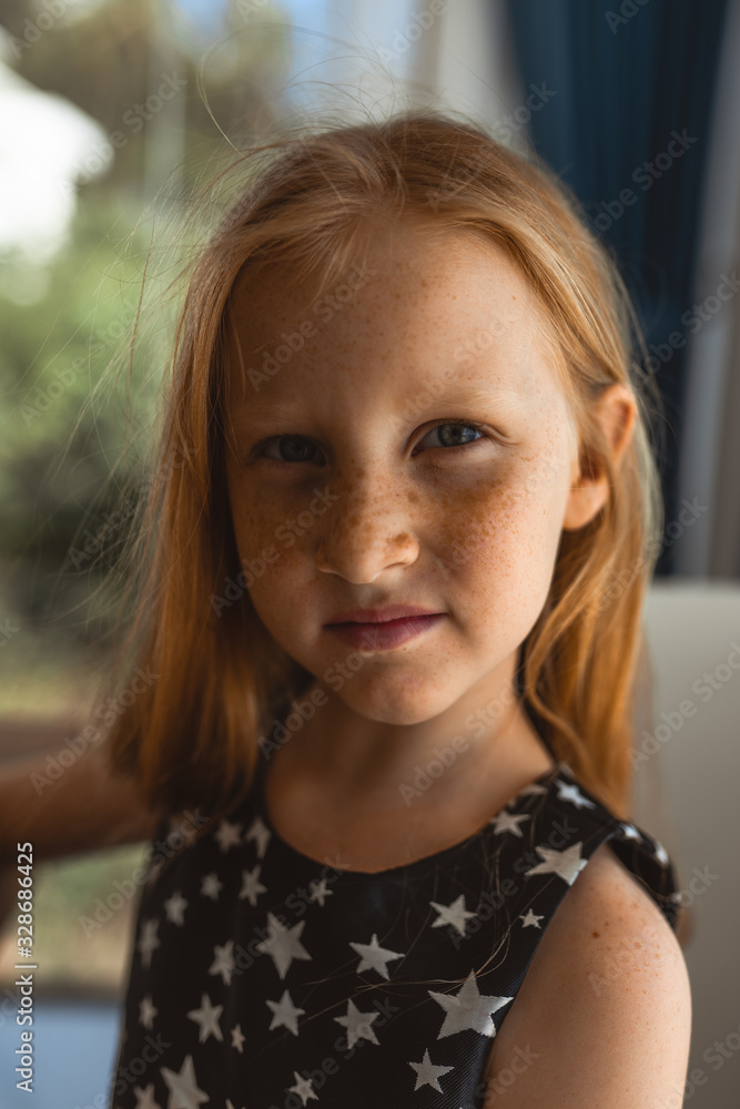 Little girl with red hair shows different emotions. Sadness, joy and ...